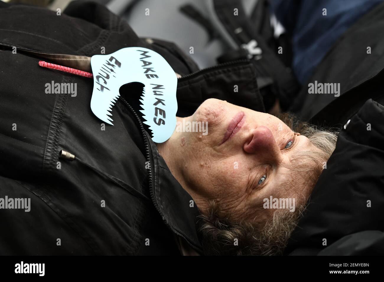 Activist seen performing a “die-in” during the protest. Anti-nuclear ...