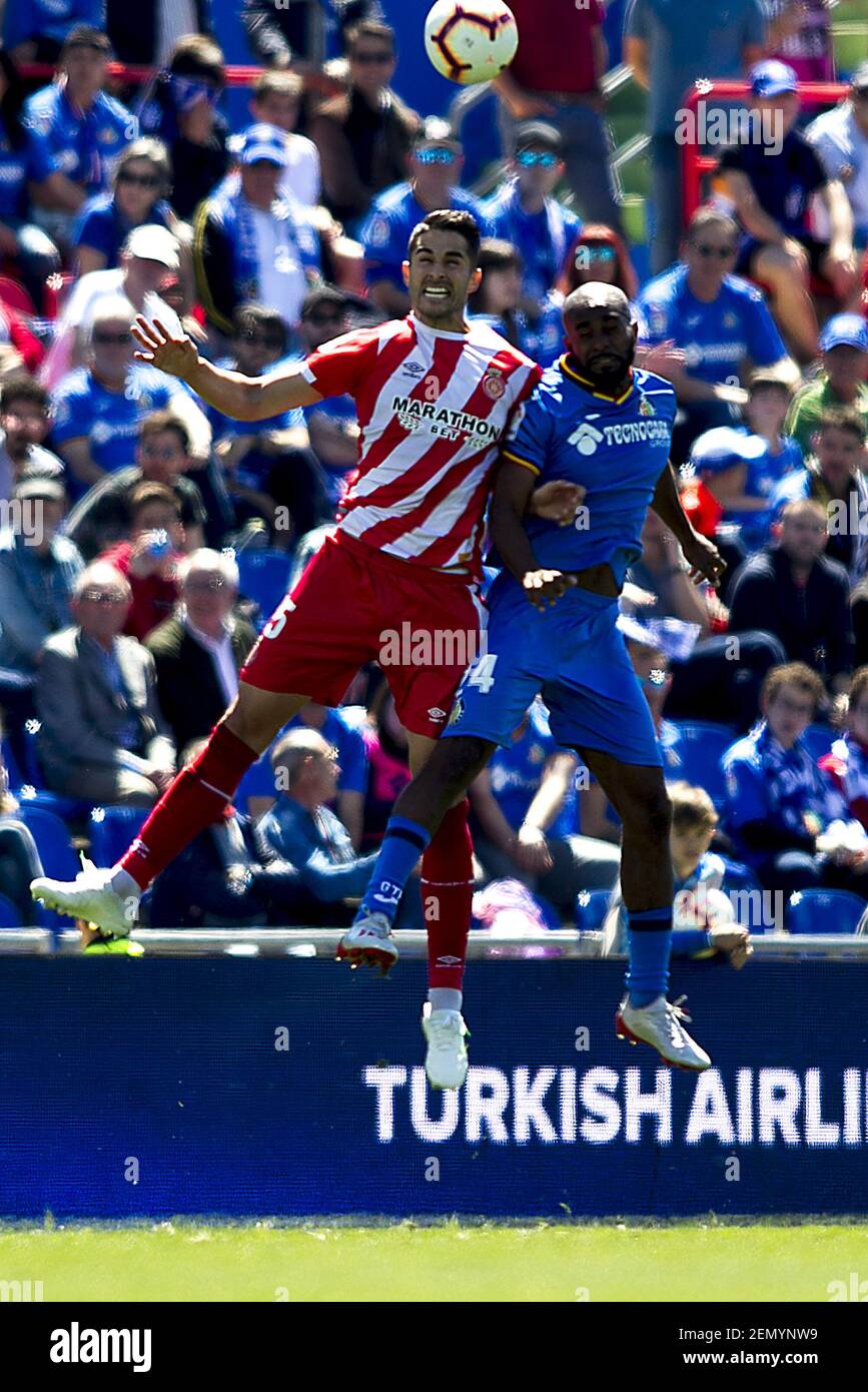 Getafe CF's Bruno Gonzalez and Girona FC's Pedro Alcala during La Liga ...