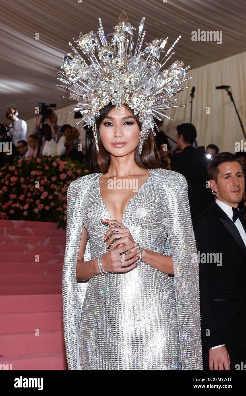 Gemma Chan walking on the red carpet at The Metropolitan Museum of Art ...