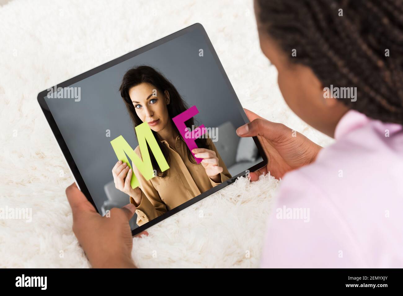 Children watching video in class hi-res stock photography and images ...