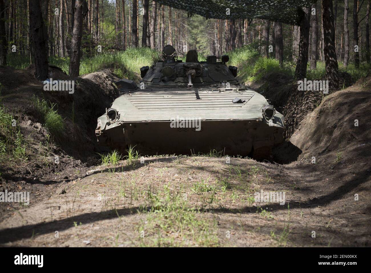 A Ukrainian BMD Infantry Fighting Vehicle is parked just behind the ...