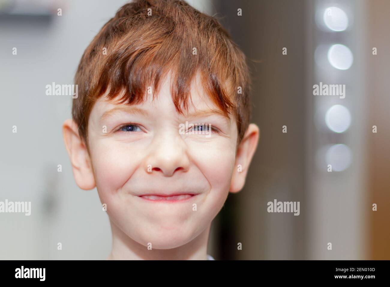 Portrait of a cute, red-haired, blue-eyed, six years old boy Stock ...