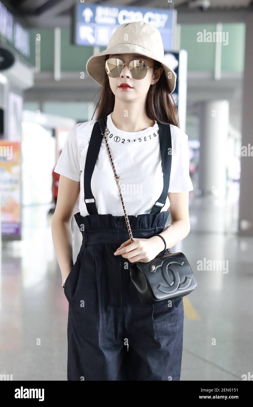 Chinese TV hostess and actress Shen Mengchen arrives at the Beijing ...
