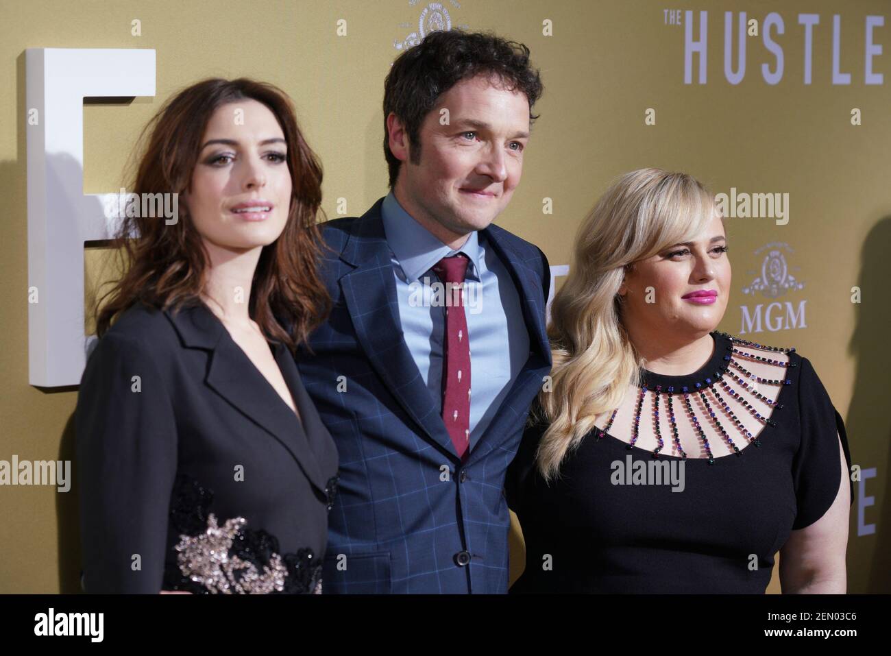 Rebel Wilson, Chris Addison, and Anne Hathaway at 'The Hustle' Los ...