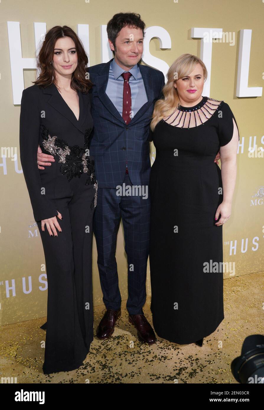 Rebel Wilson, Chris Addison, and Anne Hathaway at 'The Hustle' Los ...