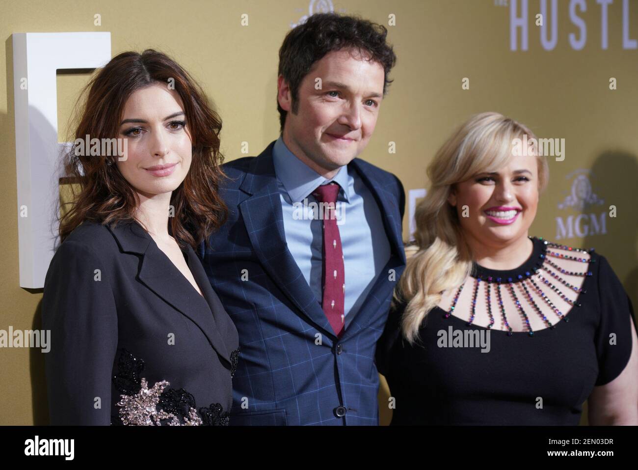 Rebel Wilson, Chris Addison, and Anne Hathaway at 'The Hustle' Los ...