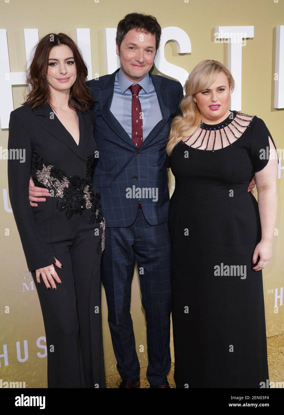 Rebel Wilson, Chris Addison, and Anne Hathaway at 'The Hustle' Los ...