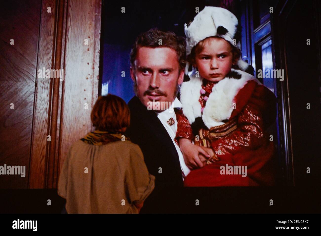 A visitor seen watching parts of a movie during the "Wajda" exhibition ...