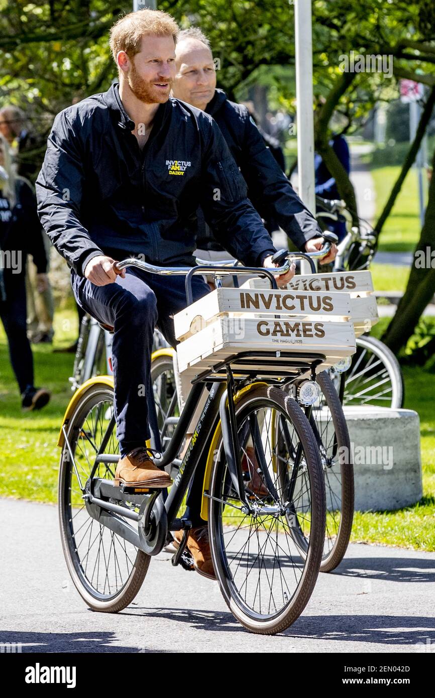 Prince Harry rides a bicycle during the Invictus Games presentation 9 ...