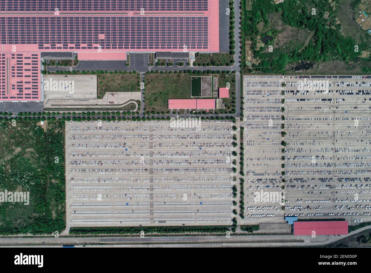 Vehicles are lined up at the auto plant of JAC Motors (Anhui Jianghuai ...