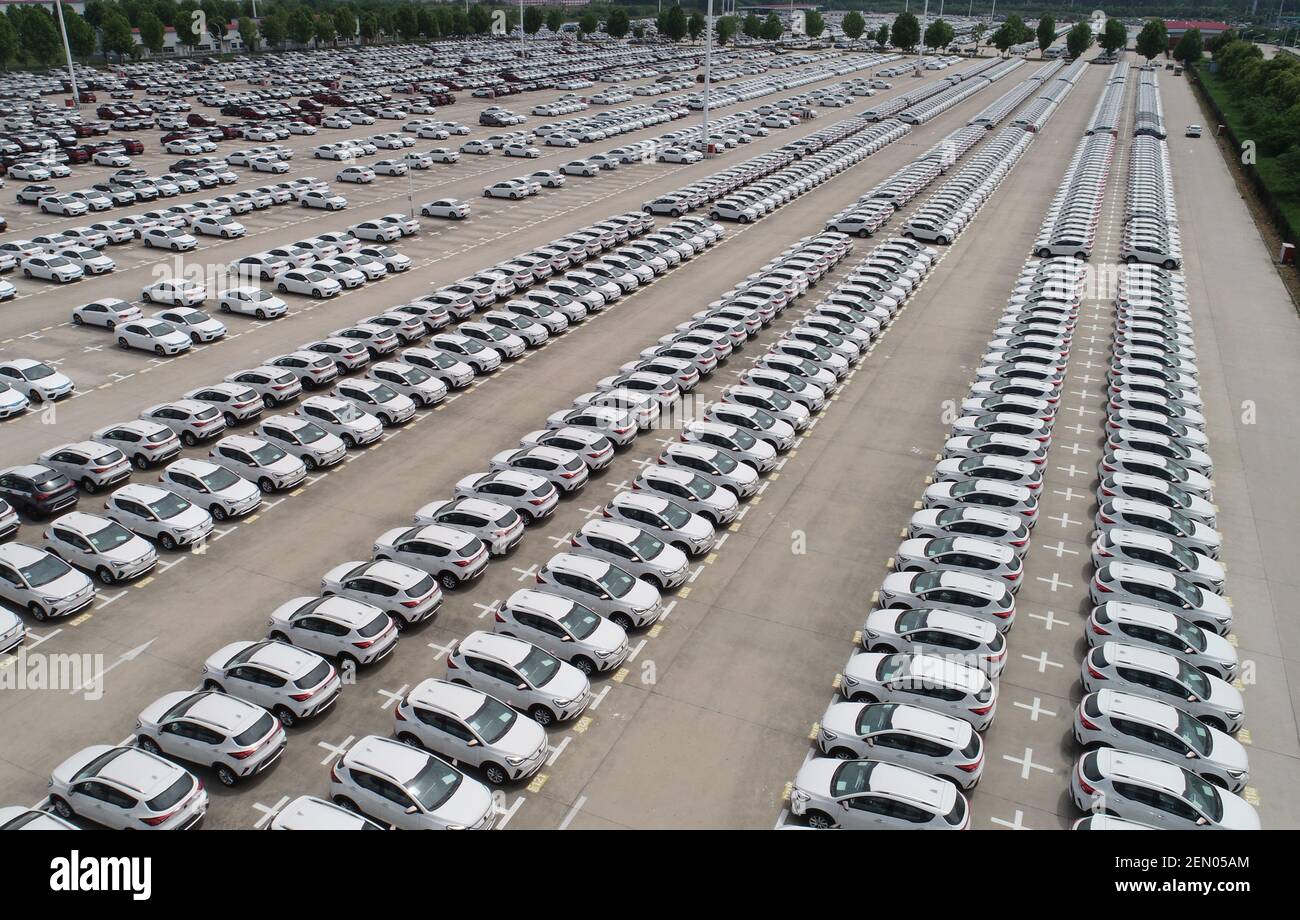 Vehicles are lined up at the auto plant of JAC Motors (Anhui Jianghuai ...