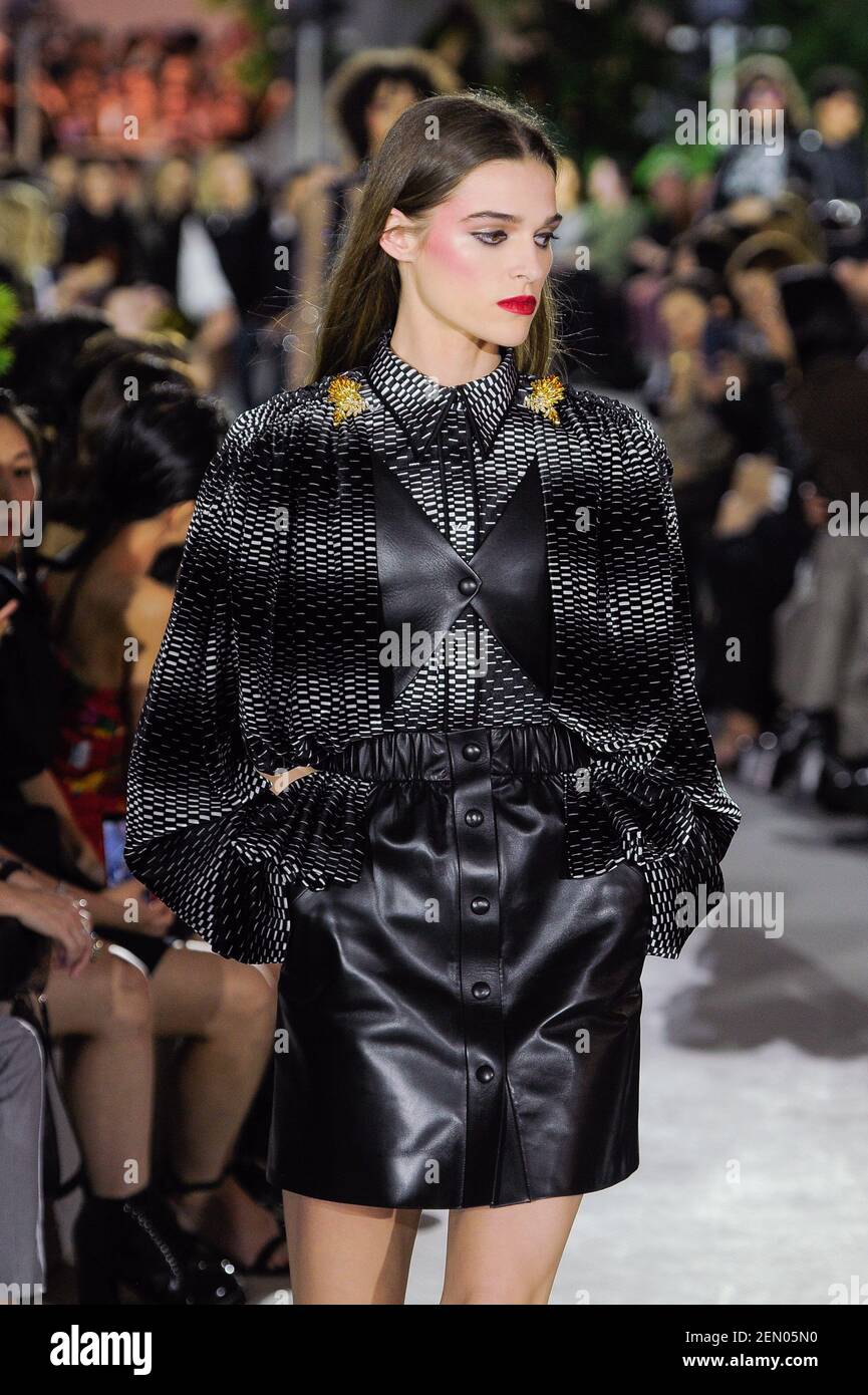Lily Vogt walks on the runway during the Louis Vuitton Resort 2020 ...