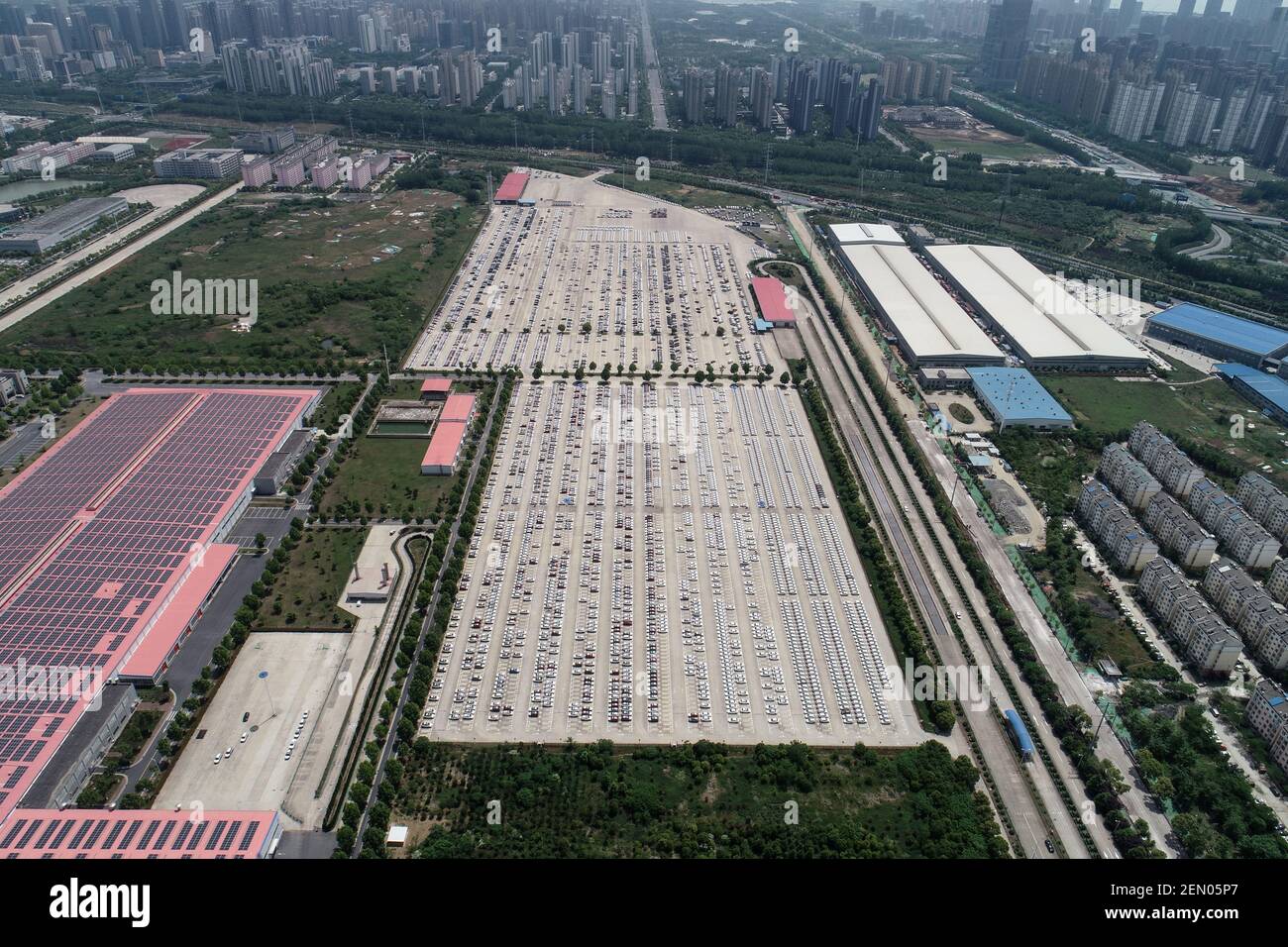 Vehicles are lined up at the auto plant of JAC Motors (Anhui Jianghuai ...