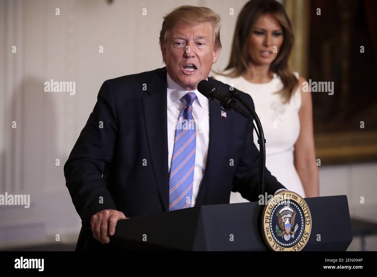 President Donald Trump, joined by first lady Melania Trump, speaks in ...