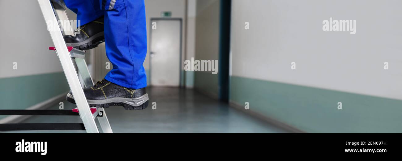 Man Climbing Step Ladder In Safety Shoes Stock Photo - Alamy