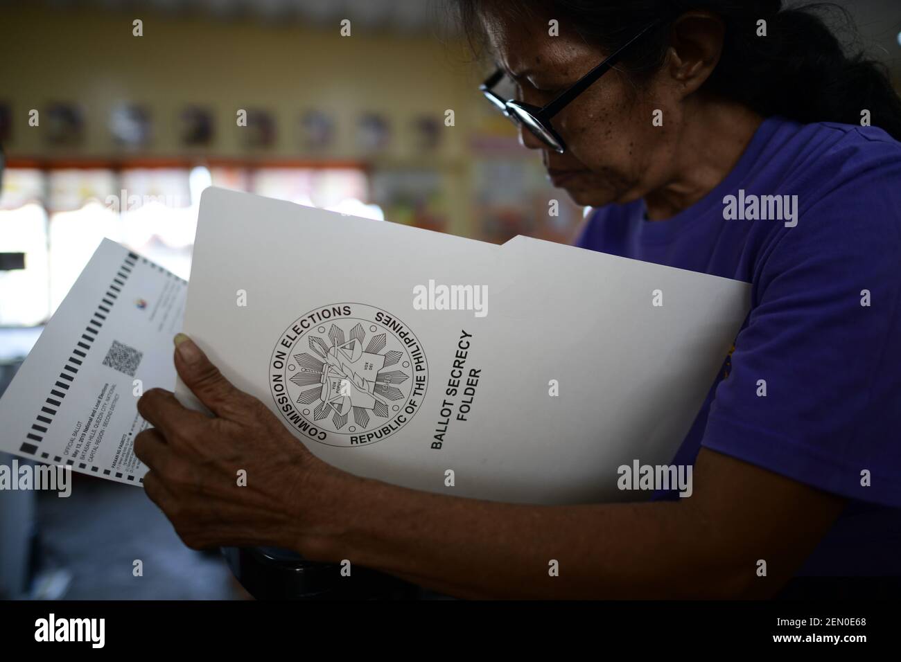 MANILA, PHILIPPINES - MAY 13: Filipino residents casts their votes in ...