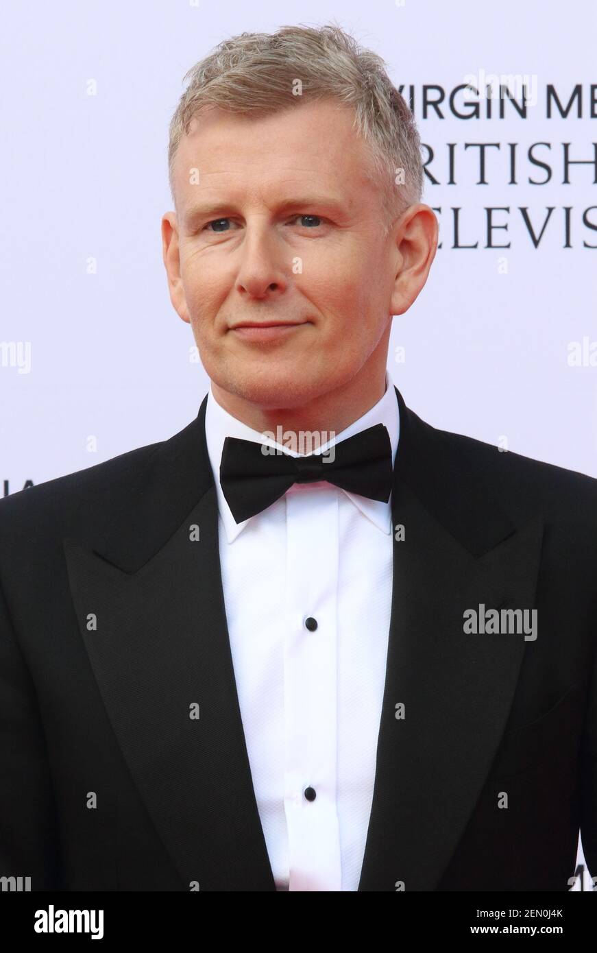 Patrick Kielty seen on the red carpet during the Virgin Media BAFTA ...