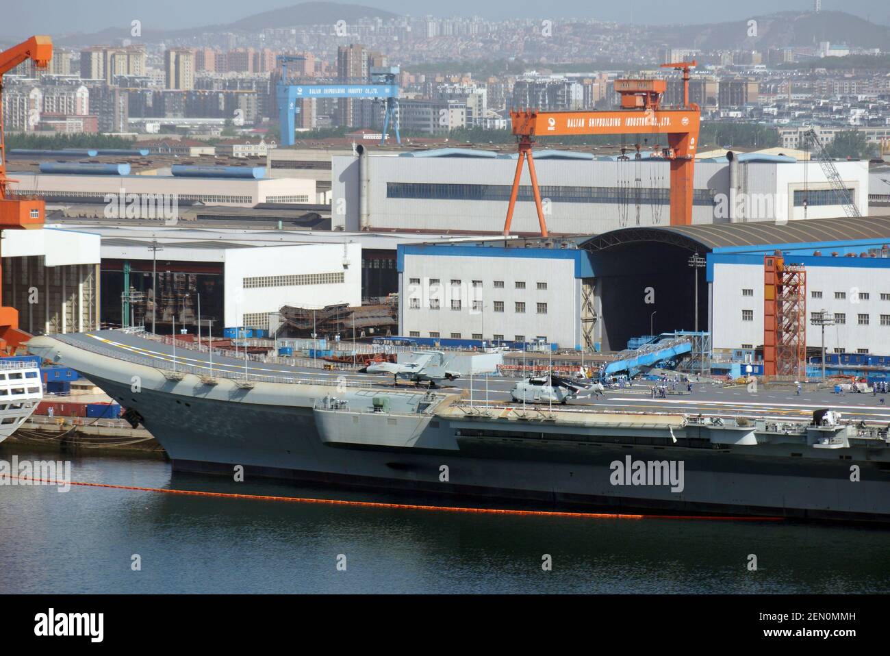 China's first domestically built aircraft carrier, the Type 001A, docks ...