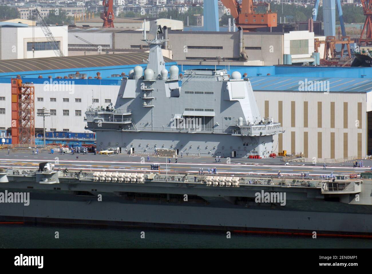 China's first domestically built aircraft carrier, the Type 001A, docks ...