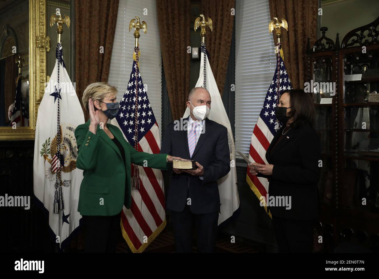 U.S. Secretary of Energy Jennifer Granholm (L) is sworn in with her ...