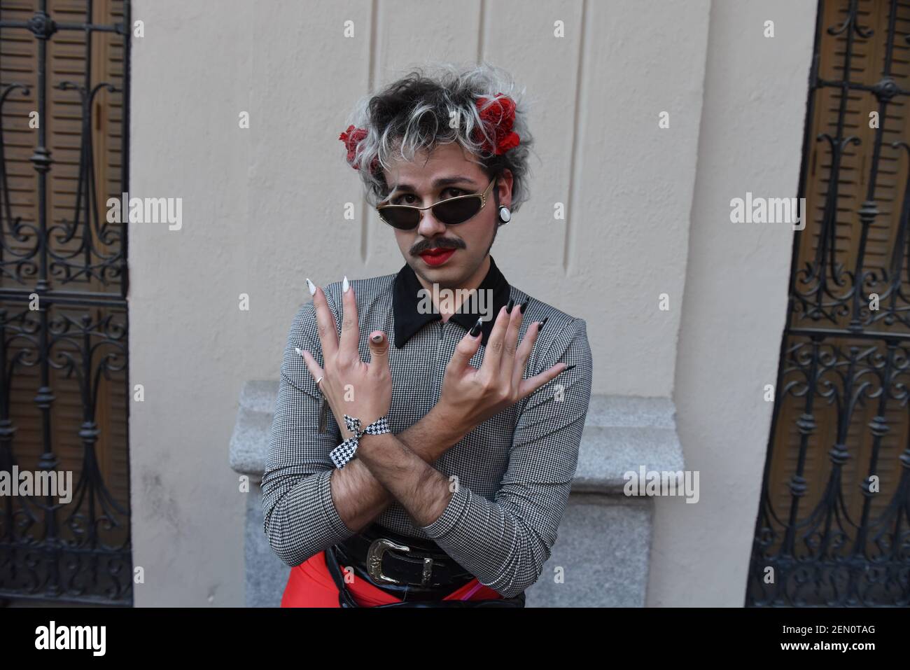 A reveller is seen posing for a picture during the Re-inventando Chulap ...