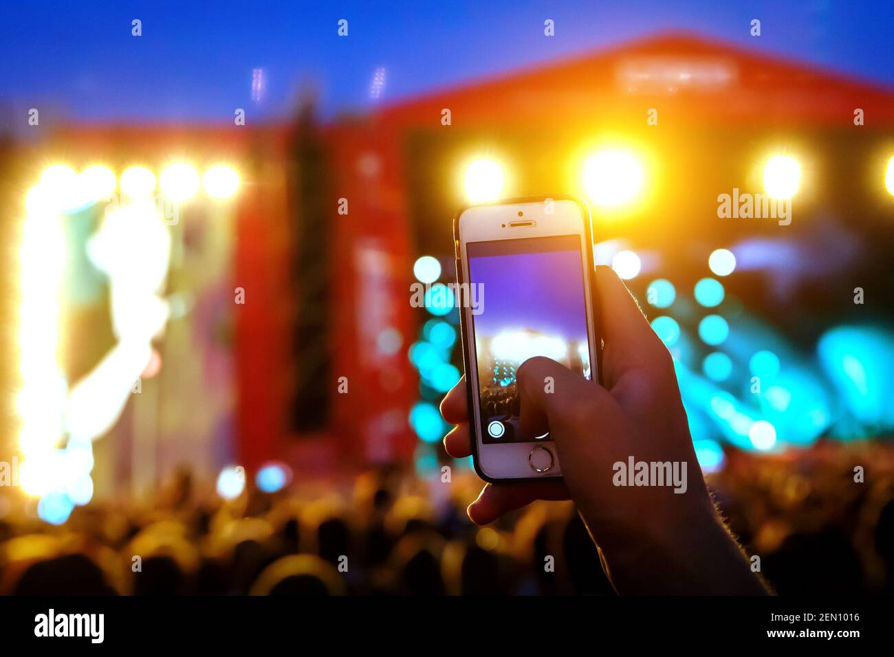 People holding their smart phones and photographing concert Stock Photo ...
