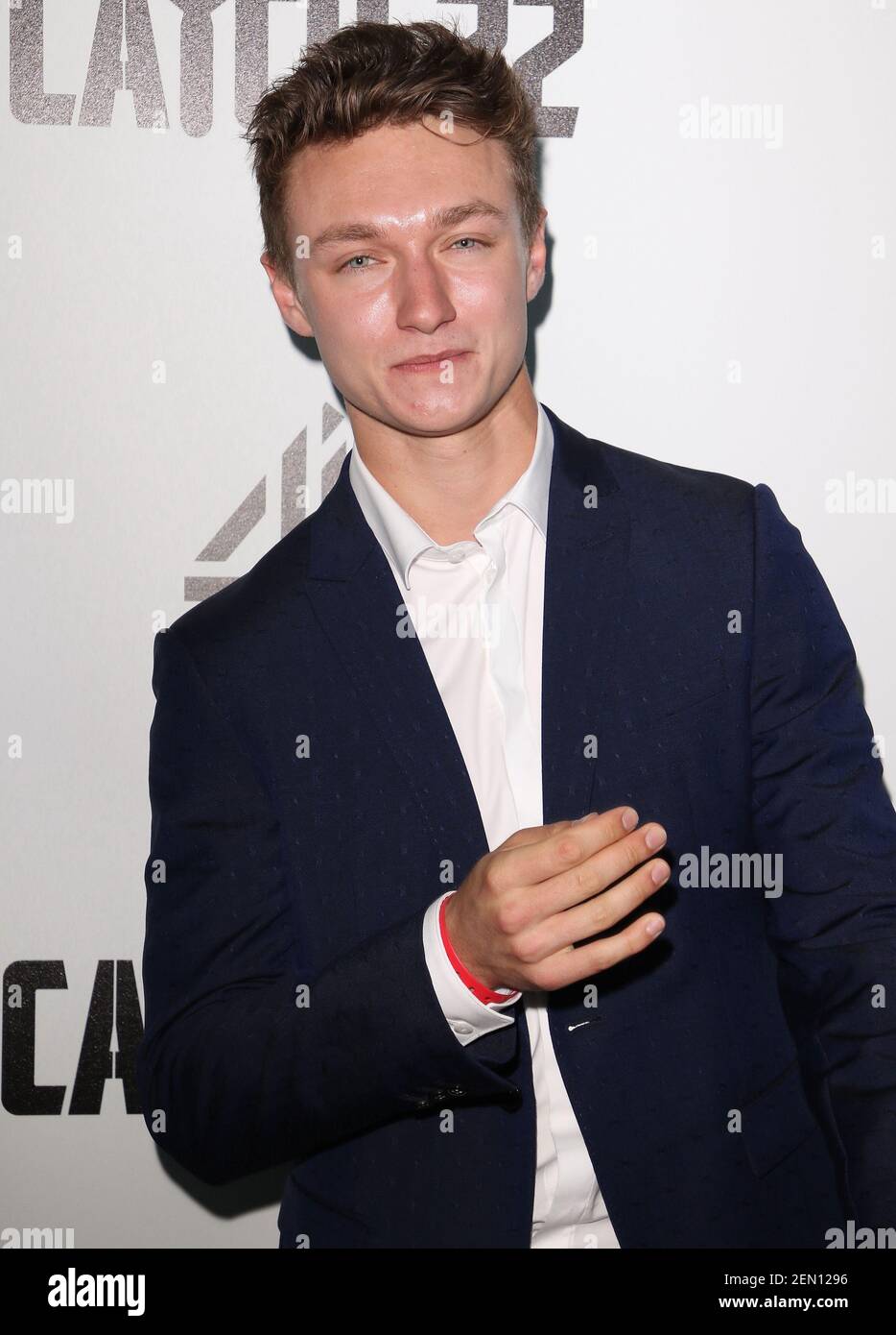 Harrison Osterfield attends the Catch 22 - TV Series premiere at the ...