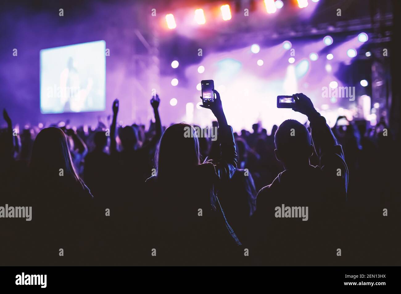 People holding their smart phones and photographing concert Stock Photo ...