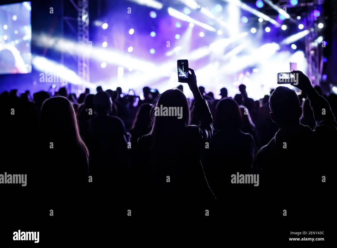 People holding their smart phones and photographing concert Stock Photo ...