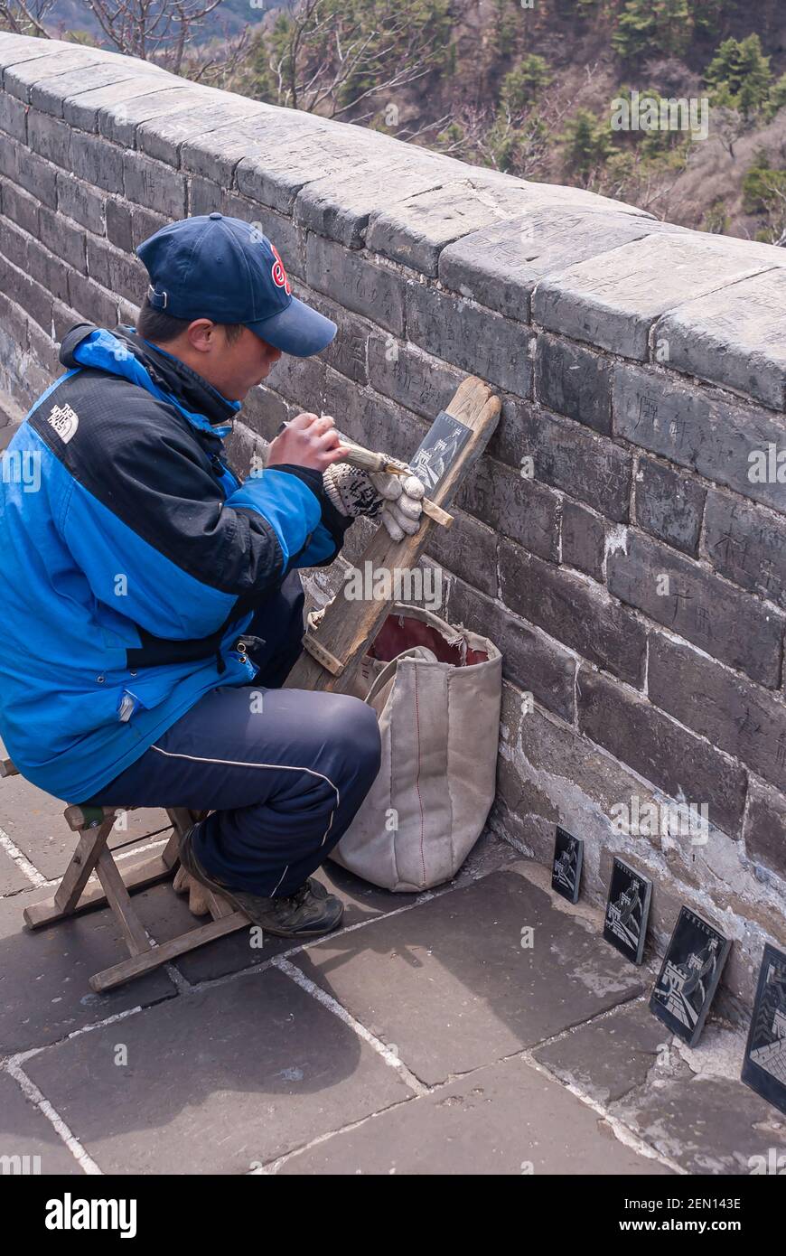 Beijing, China - April 28, 2010: Great Wall of China. Closeup of male ...