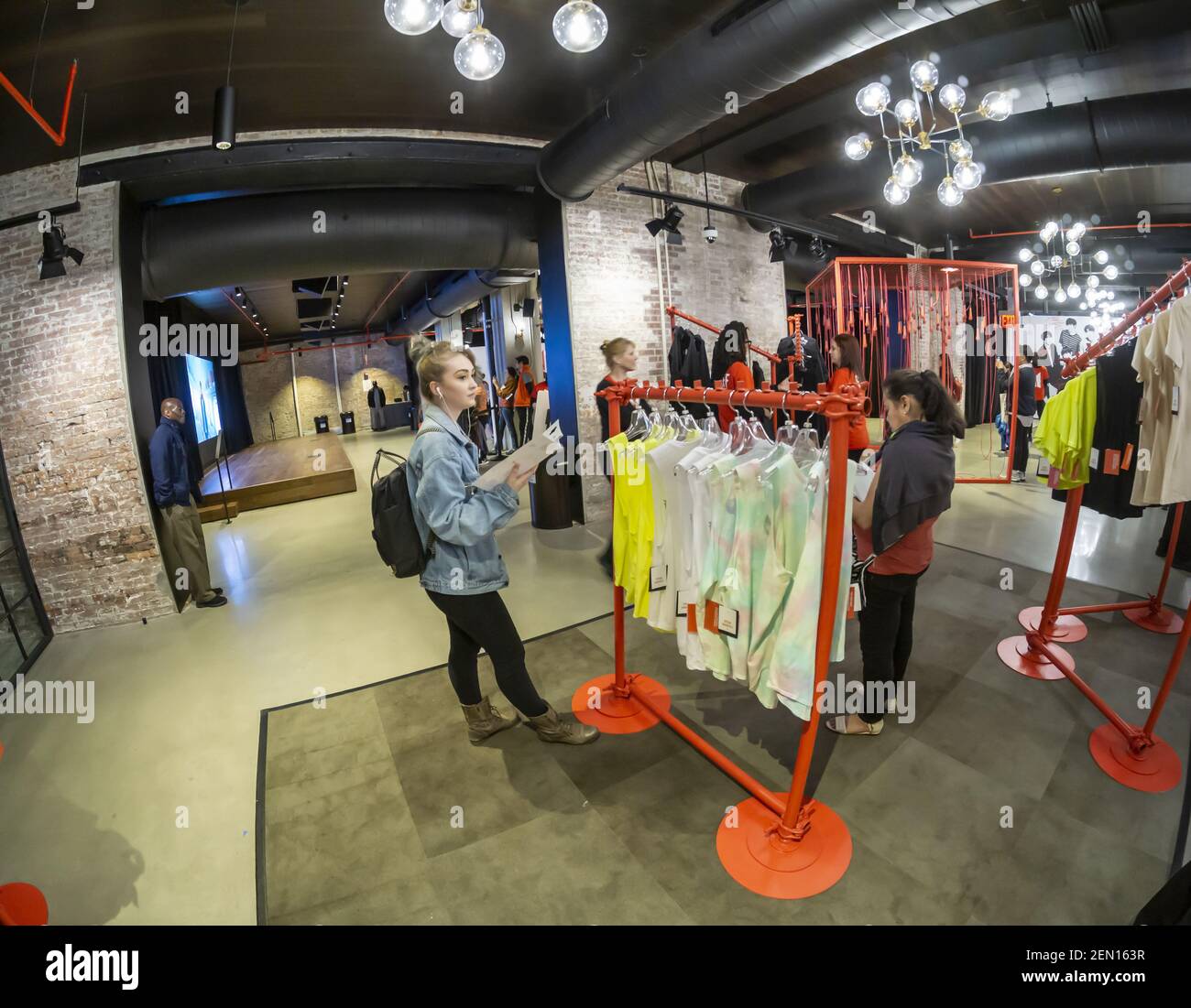 Fans of the Koran K-Pop band BTS shop for band â€œmerchâ€ at a pop-up ...