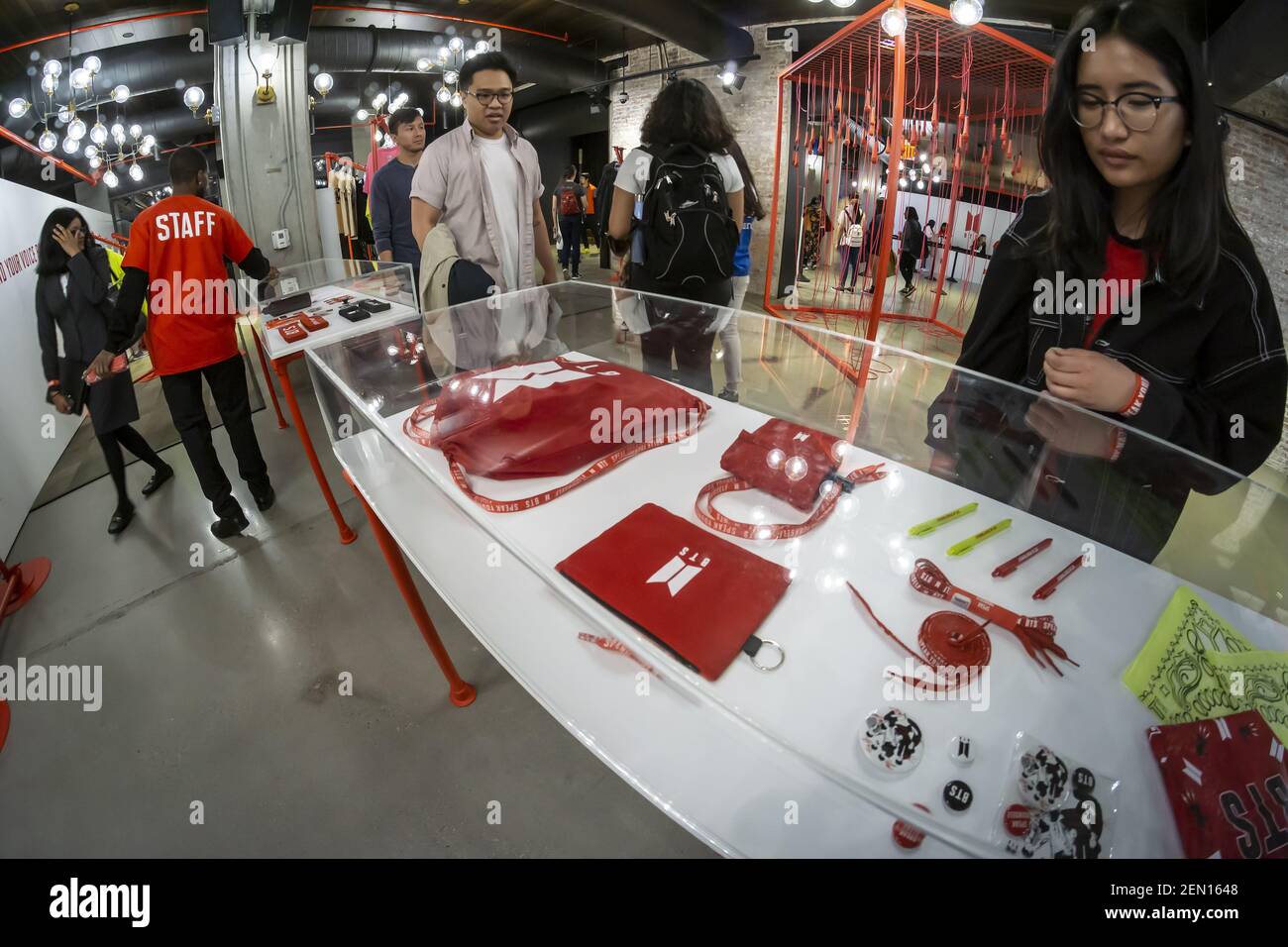 Fans of the Koran K-Pop band BTS shop for band â€œmerchâ€ at a pop-up ...