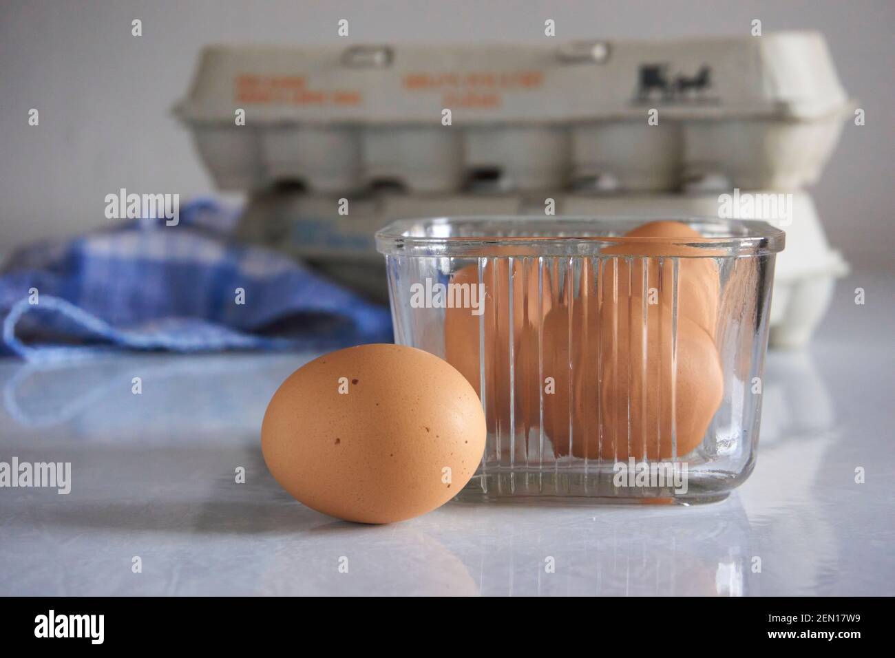 Organic brown eggs in containers Stock Photo - Alamy