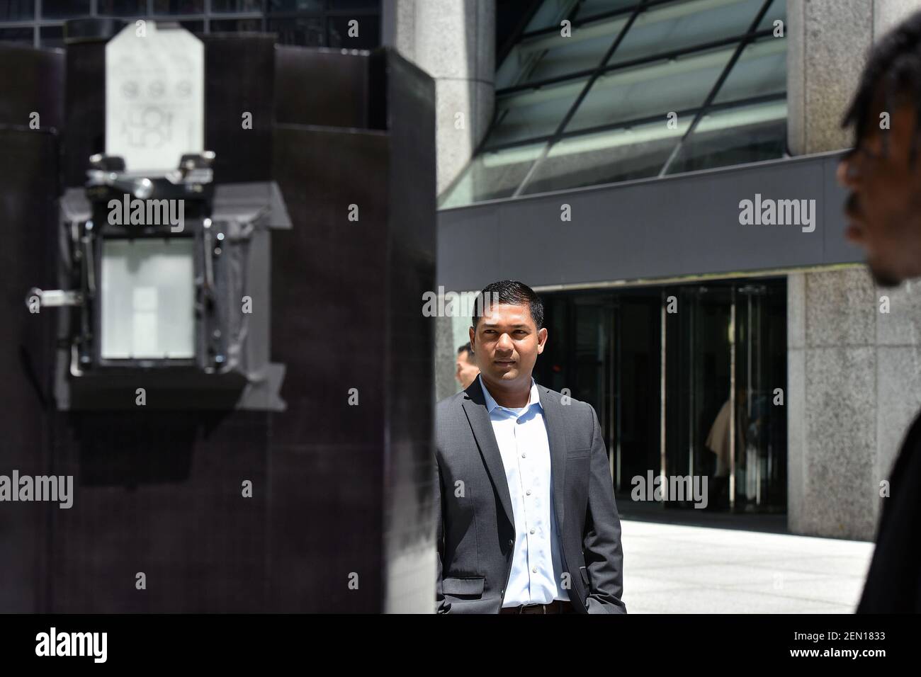 Business man Bhisham Somai stands in front of a custom made large ...