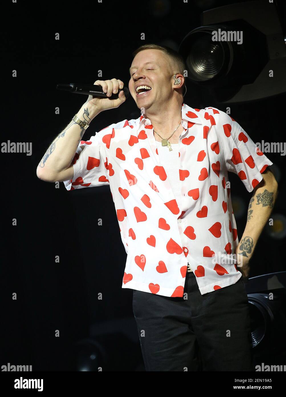 Macklemore performs onstage during the MusiCares Concert for Recovery ...