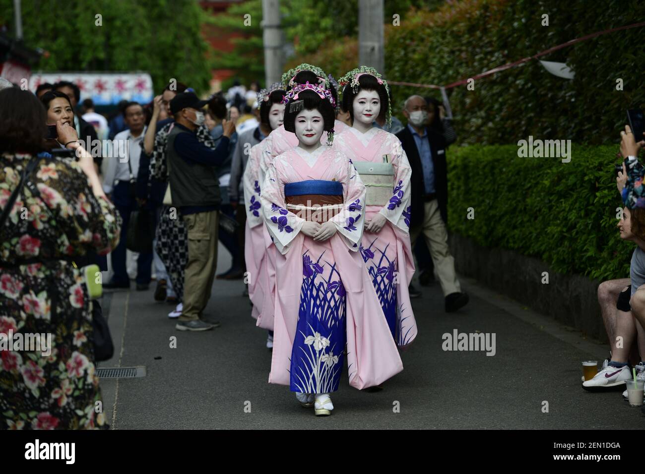 TOKYO, JAPAN - MAY 18: Maiko dancers walk after the performance during ...