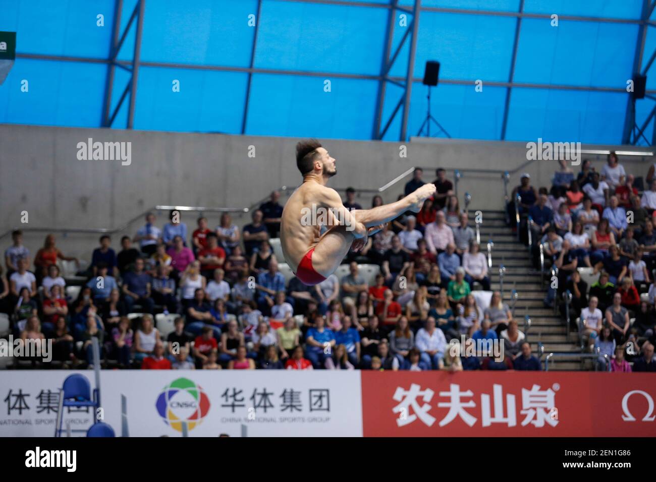 Francois IMBEAU-DULAC of Canada competes in the Men's 3 meter ...