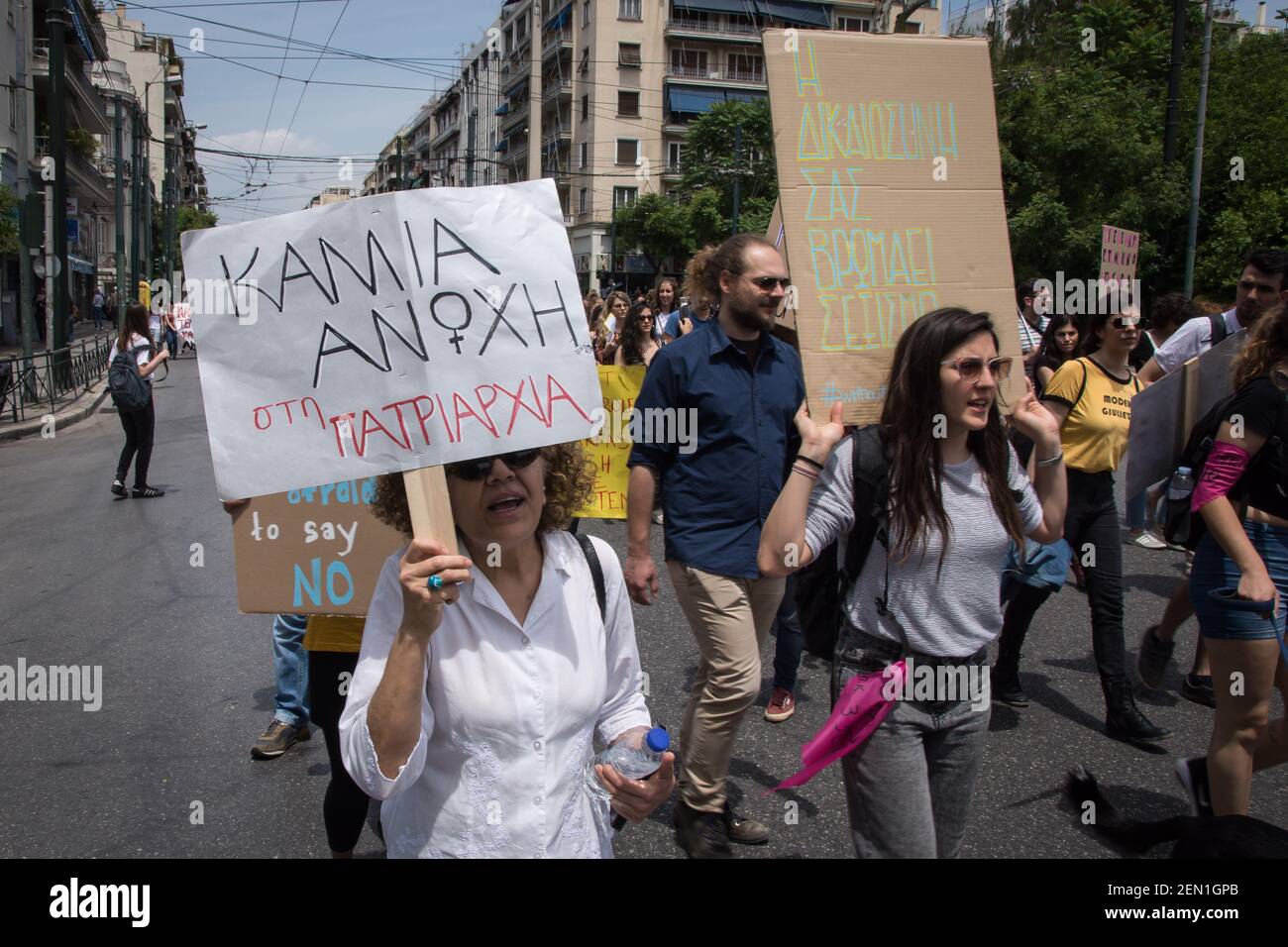 Protesters seen holding placard while shouting slogans during the ...