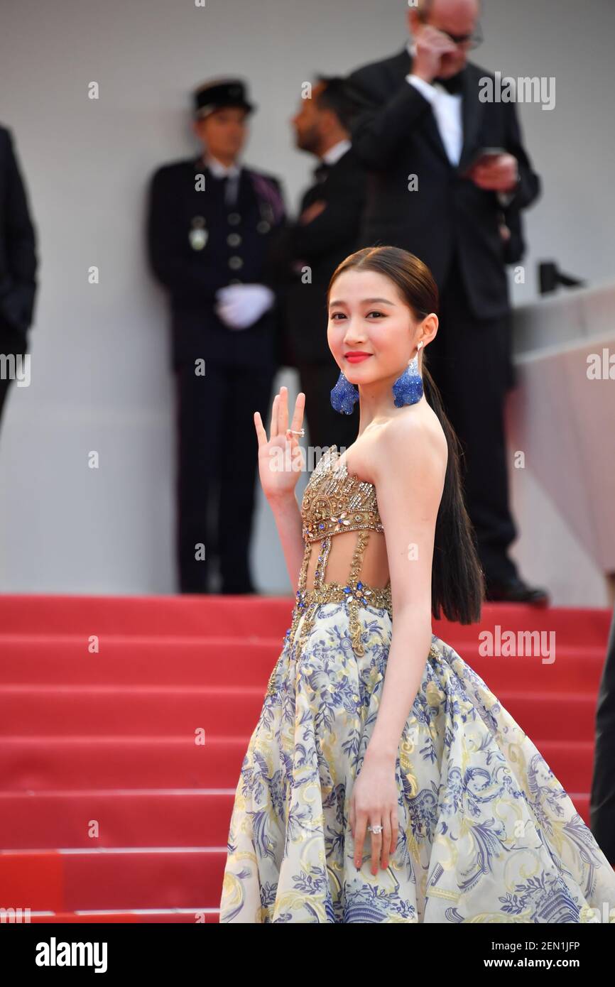 Chinese actress Guan Xiaotong poses as she arrives on the red carpet for the 72nd Cannes ...