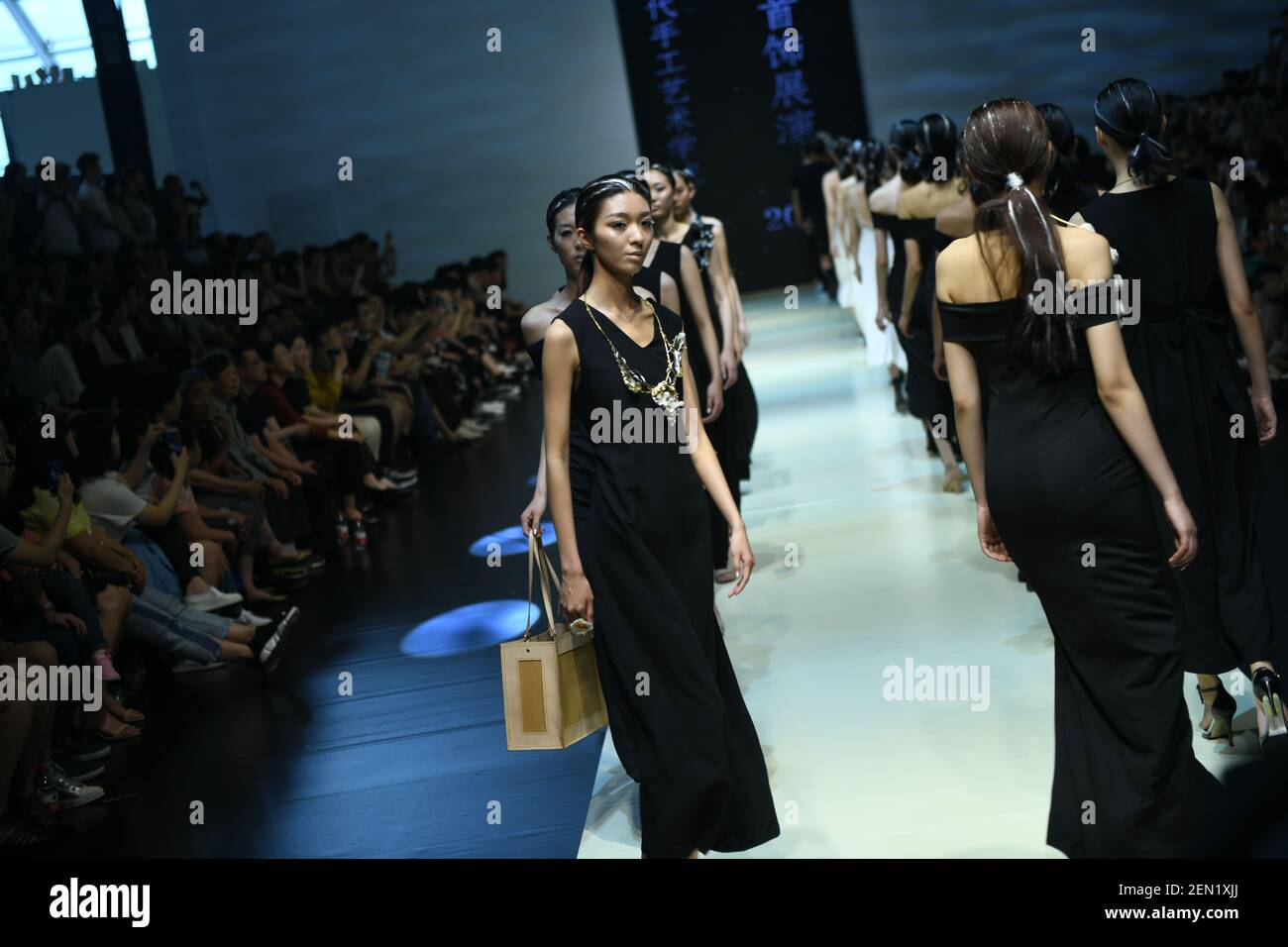 A model displays a new creation featuring traditional Chinese elements ...