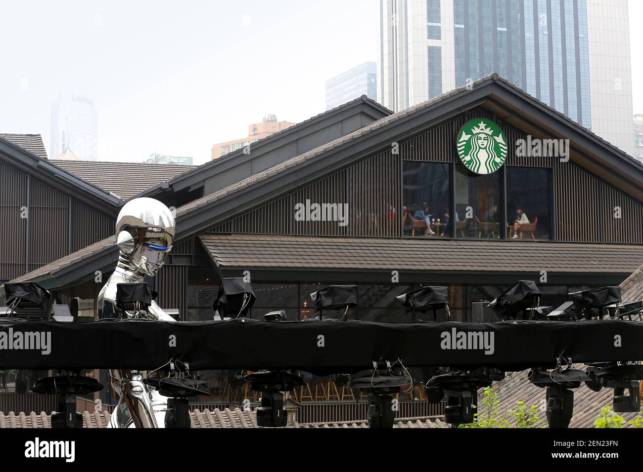 A 10-meter-tall sculpture featuring shape of a robotic beauty is ...