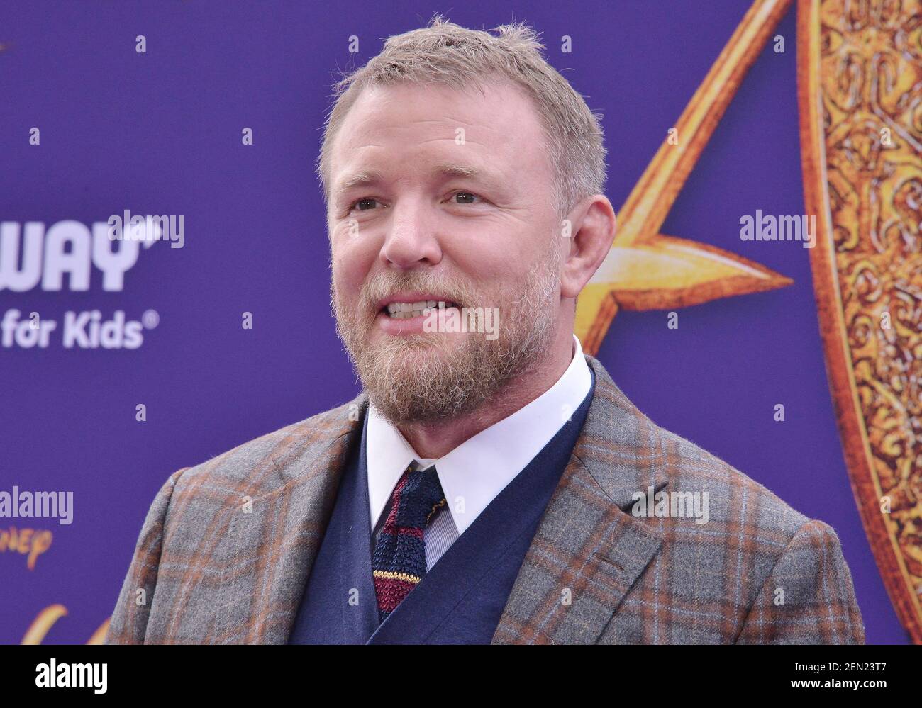 Guy Ritchie arrives at the Disney "Aladdin" Los Angeles Premiere held ...