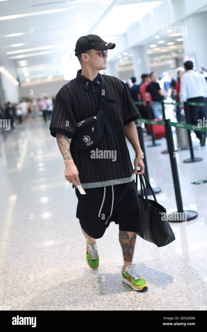 Chinese actor and model Jiang Jinfu arrives at the Shanghai Hongqiao ...