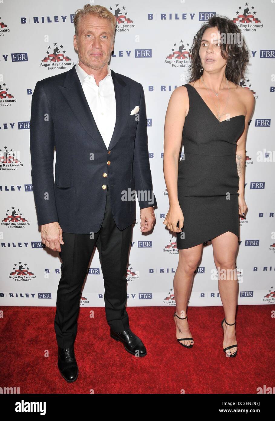 (L-R) Dolph Lundgren and Guest at the Sugar Ray Leonard Foundation's ...