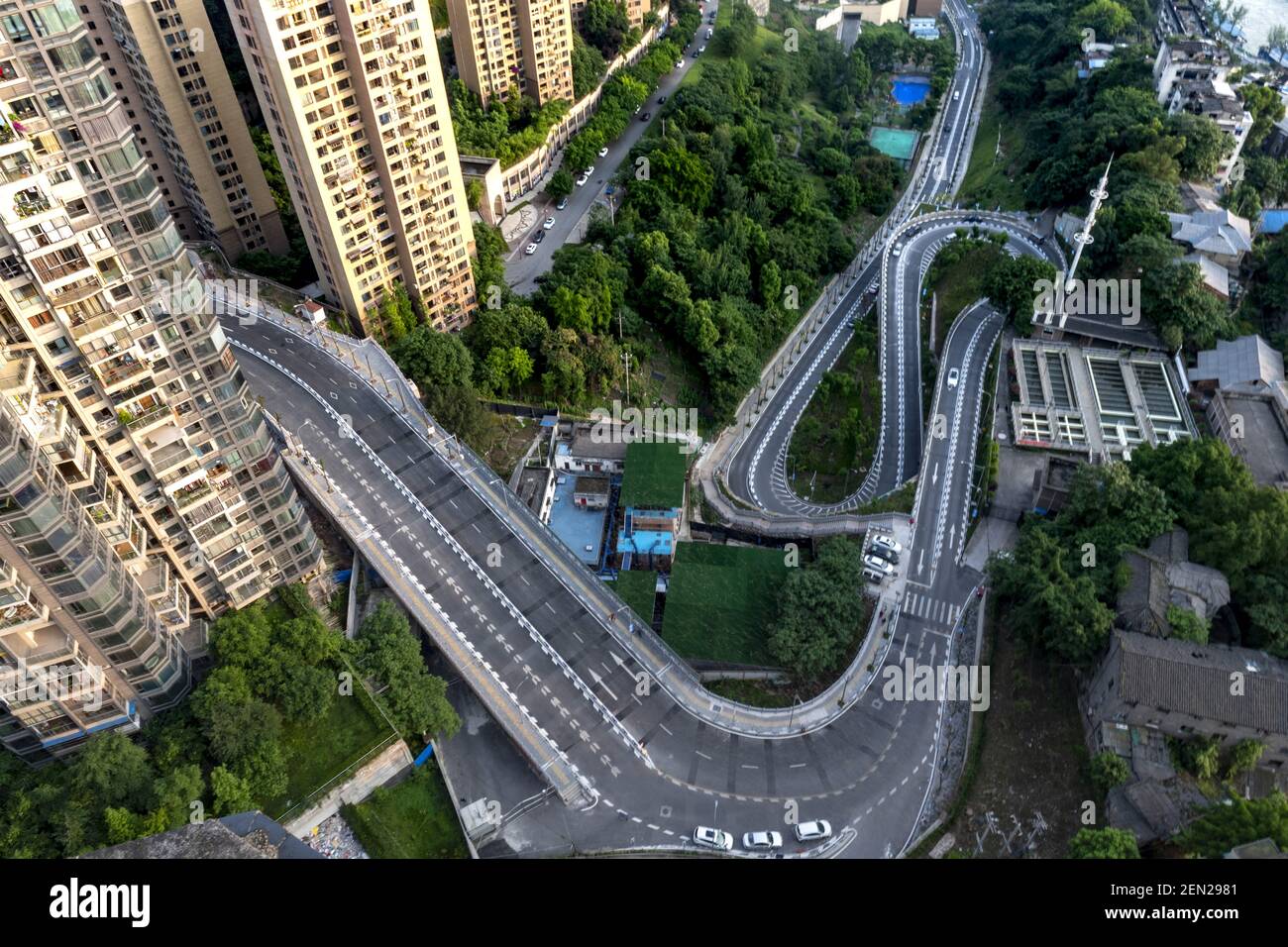 Aerial view of a stunning spiral highway, which is part of the city's ...
