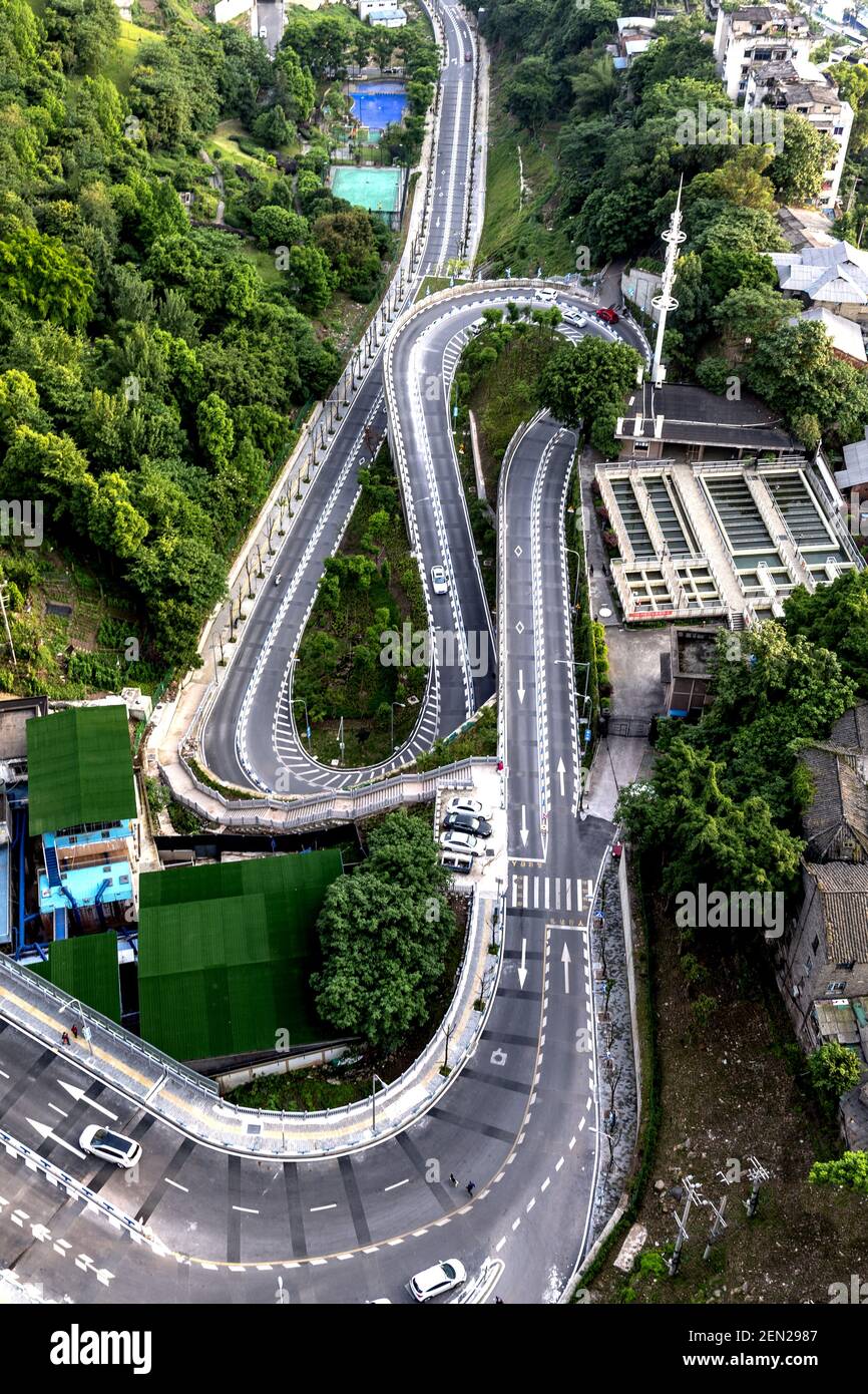 Aerial view of a stunning spiral highway, which is part of the city's ...