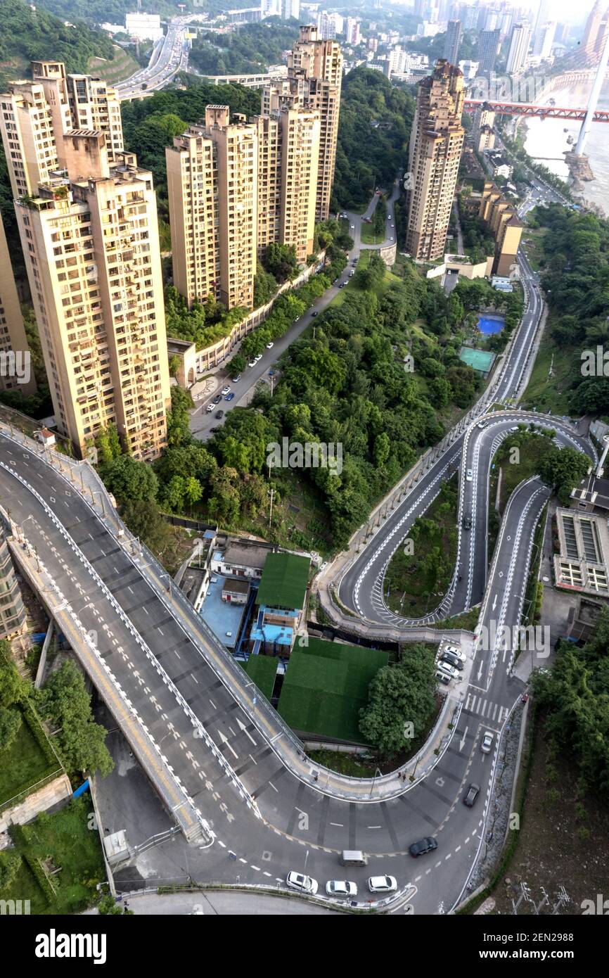 Aerial view of a stunning spiral highway, which is part of the city's ...