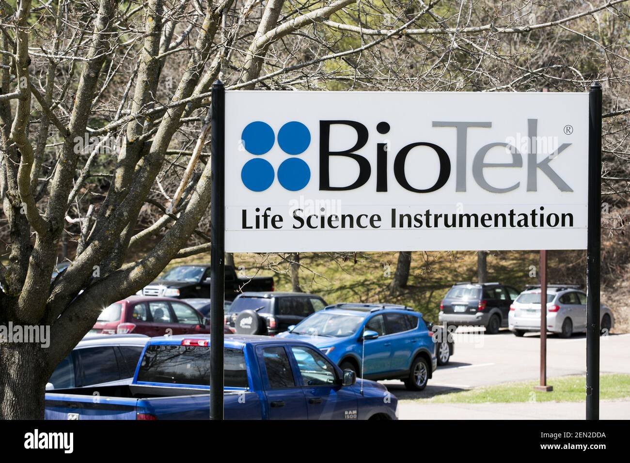 A logo sign outside of the headquarters of BioTek Instruments, Inc., in ...