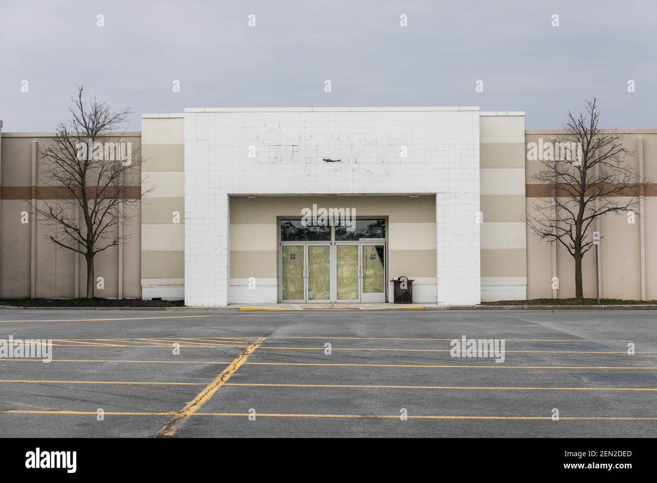 The outline of a Sears logo sign outside of a closed retail store ...