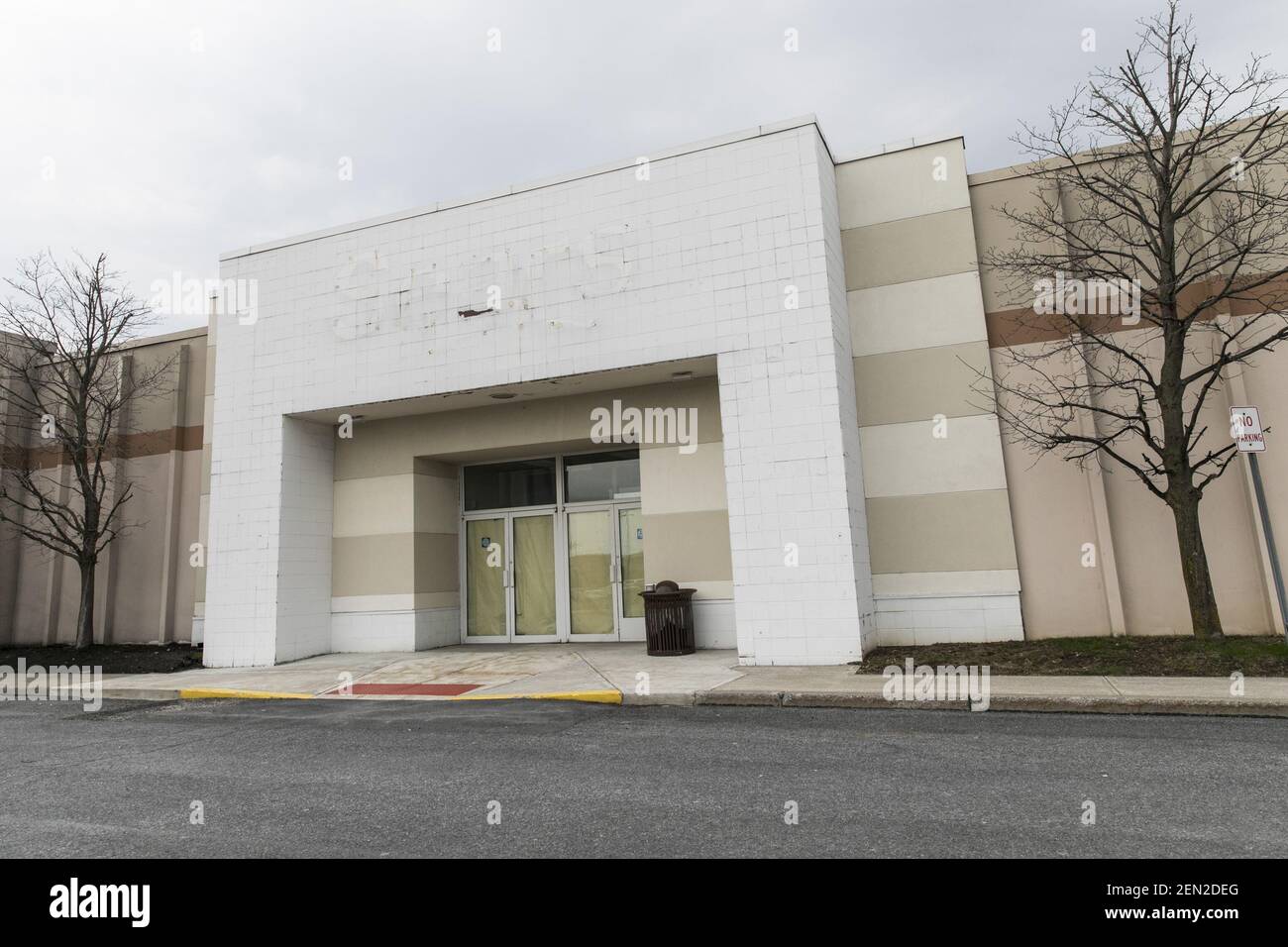 The outline of a Sears logo sign outside of a closed retail store ...